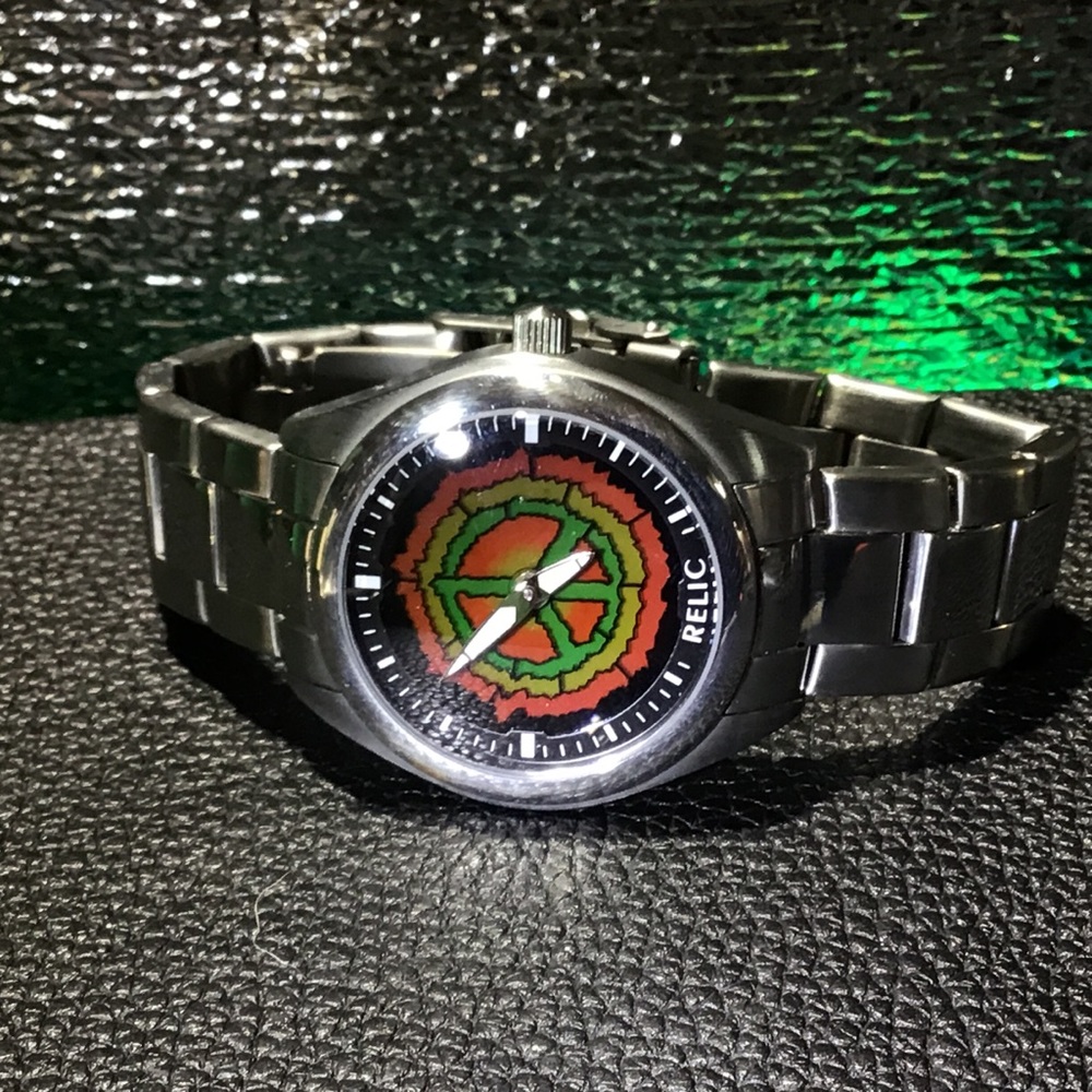 Relic ~ Animated Peace Sign - Gem